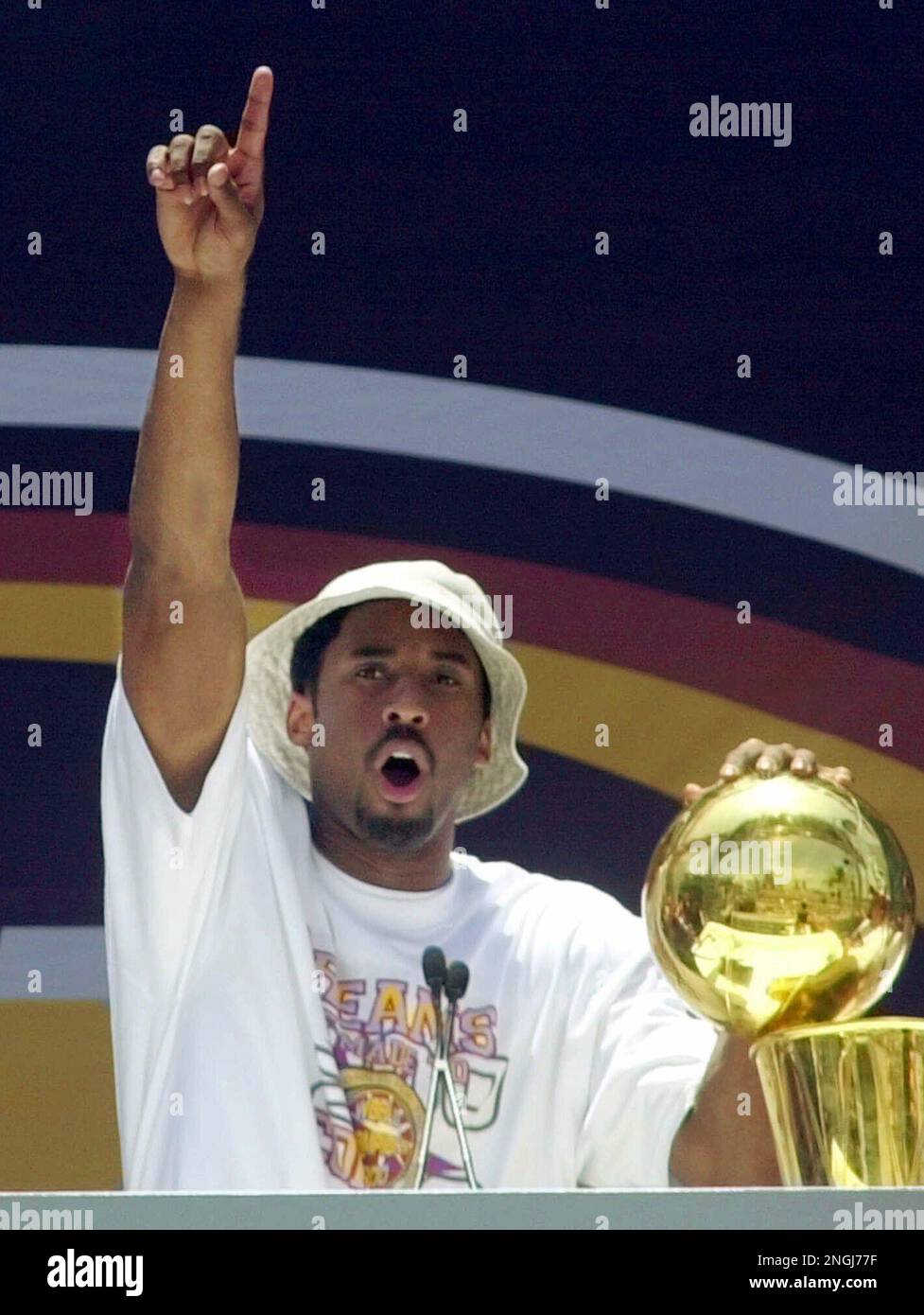 Los Angeles Lakers' guard Kobe Bryant holds the NBA Championship trophy ...