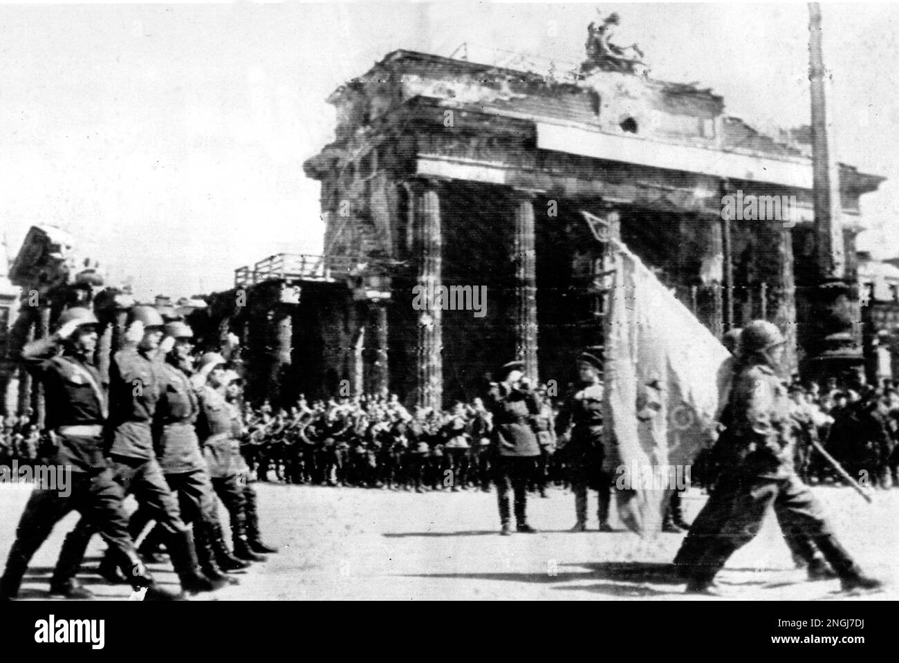 Soviet troops march past the Brandenburg Gate in Berlin, May 20, 1945 ...
