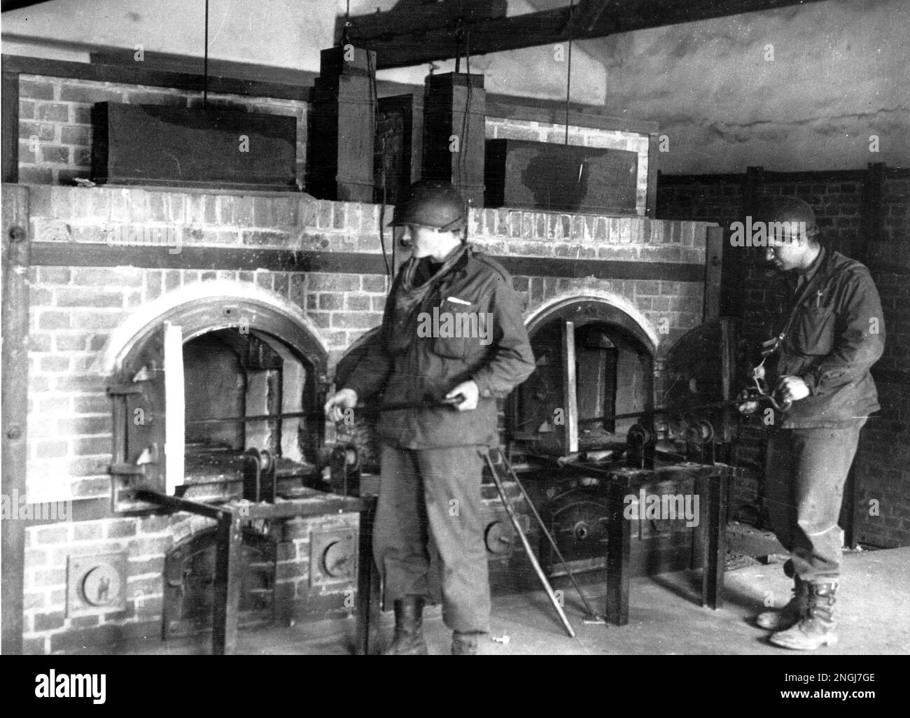 G.I.'s inspect the ovens of the Dachau, Germany concentration camp ...