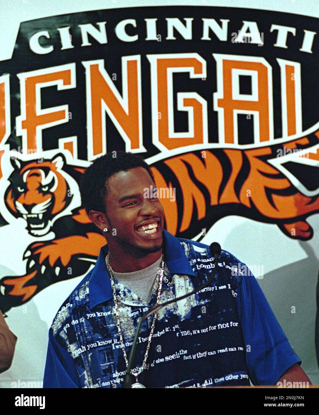 New Cincinnati Bengals wide receiver Peter Warrick talks with reporters ...