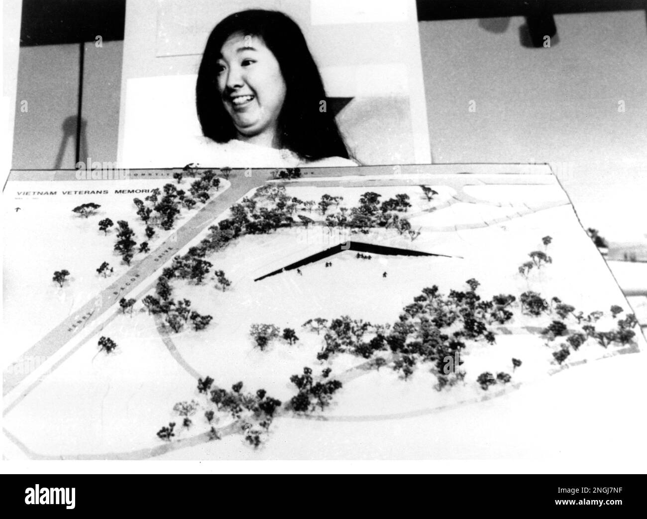Maya Ying Lin, of Yale University, holds up the winning design for the ...