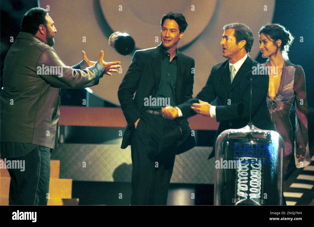 Presenter Mel Gibson, second from right, throws the "Best Movie" award ...