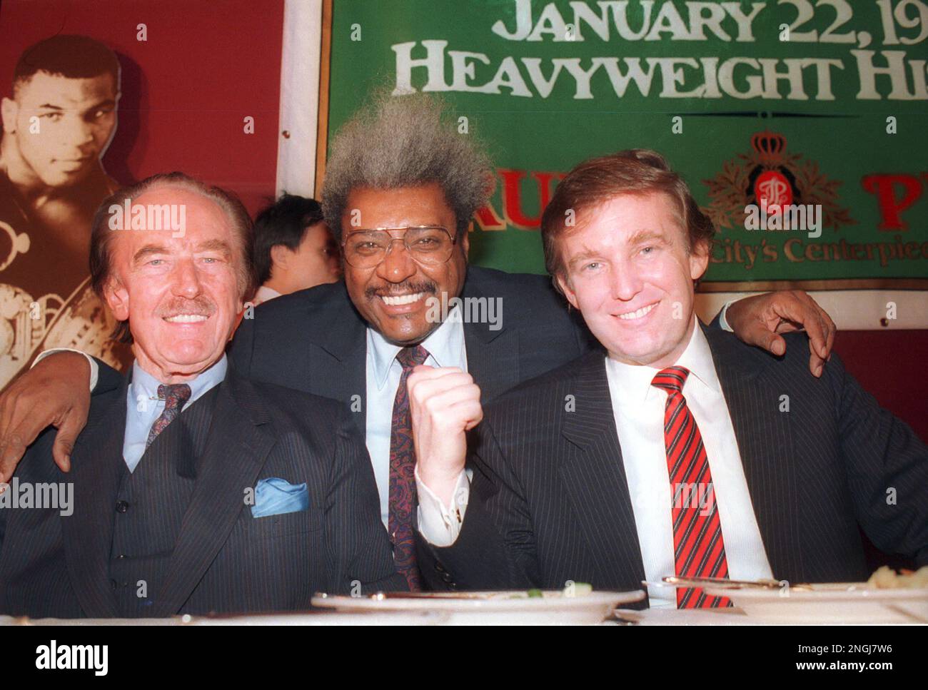 Donald Trump, right, pictured with his father, Fred Trump, far left ...