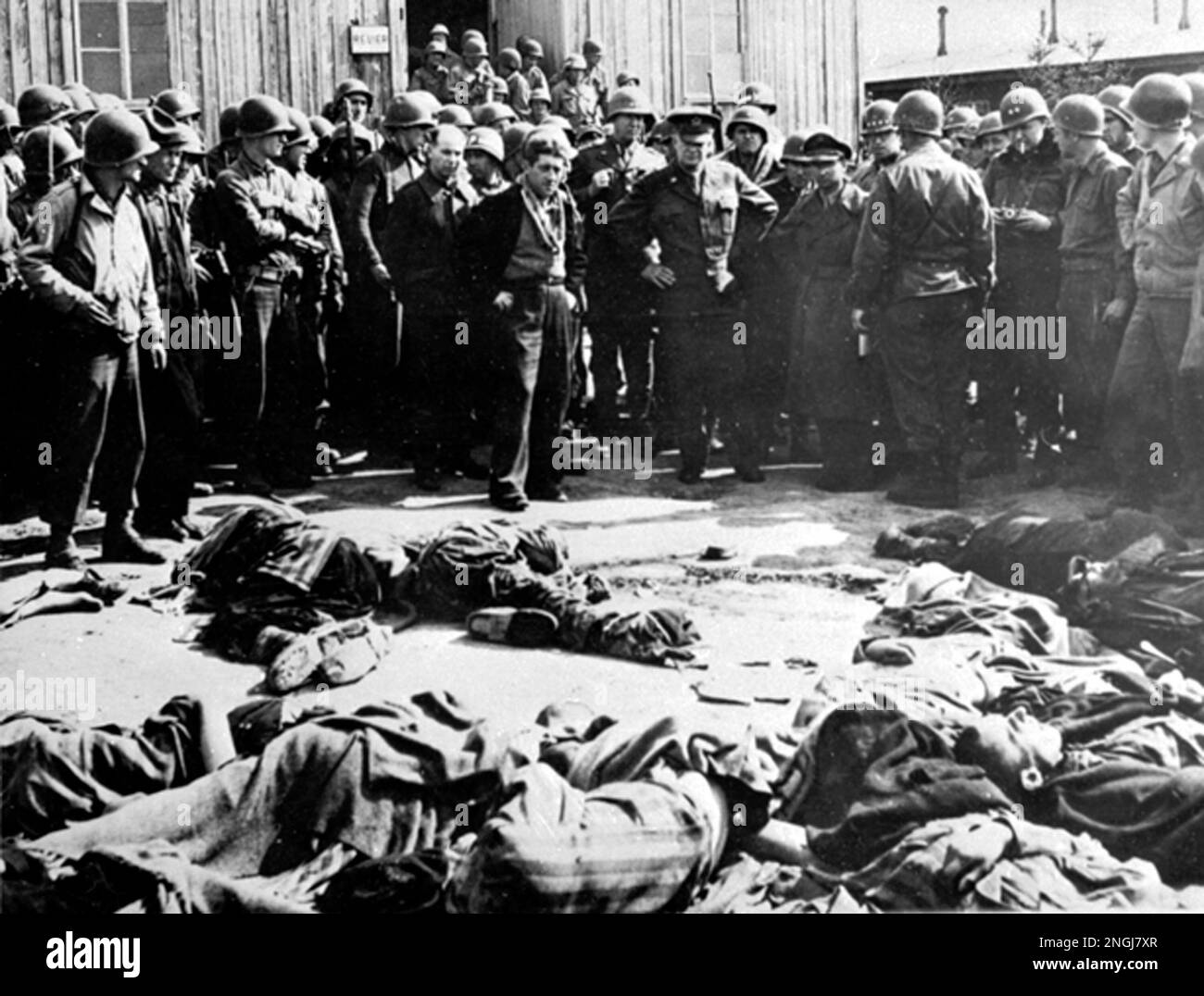 Gen. Dwight D. Eisenhower, center, supreme Allied commander, views the ...