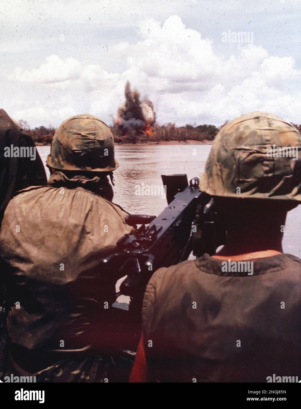 Navy Seals watch the detonation of a satchel charge they set to destroy ...