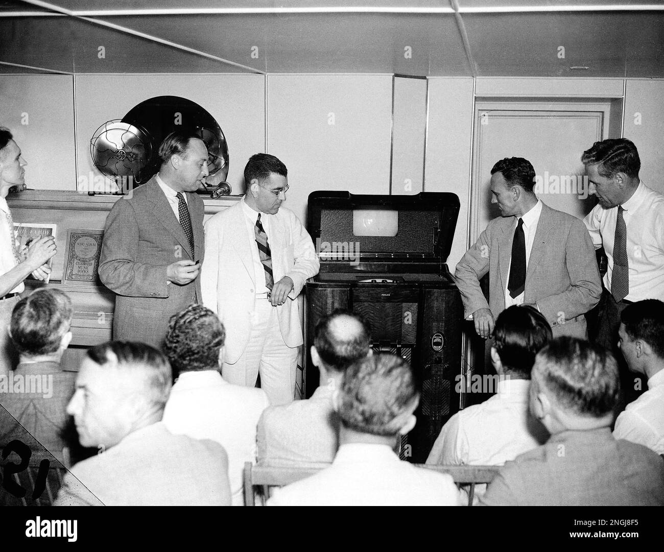 An early television model is demonstrated by Philco Radio and ...