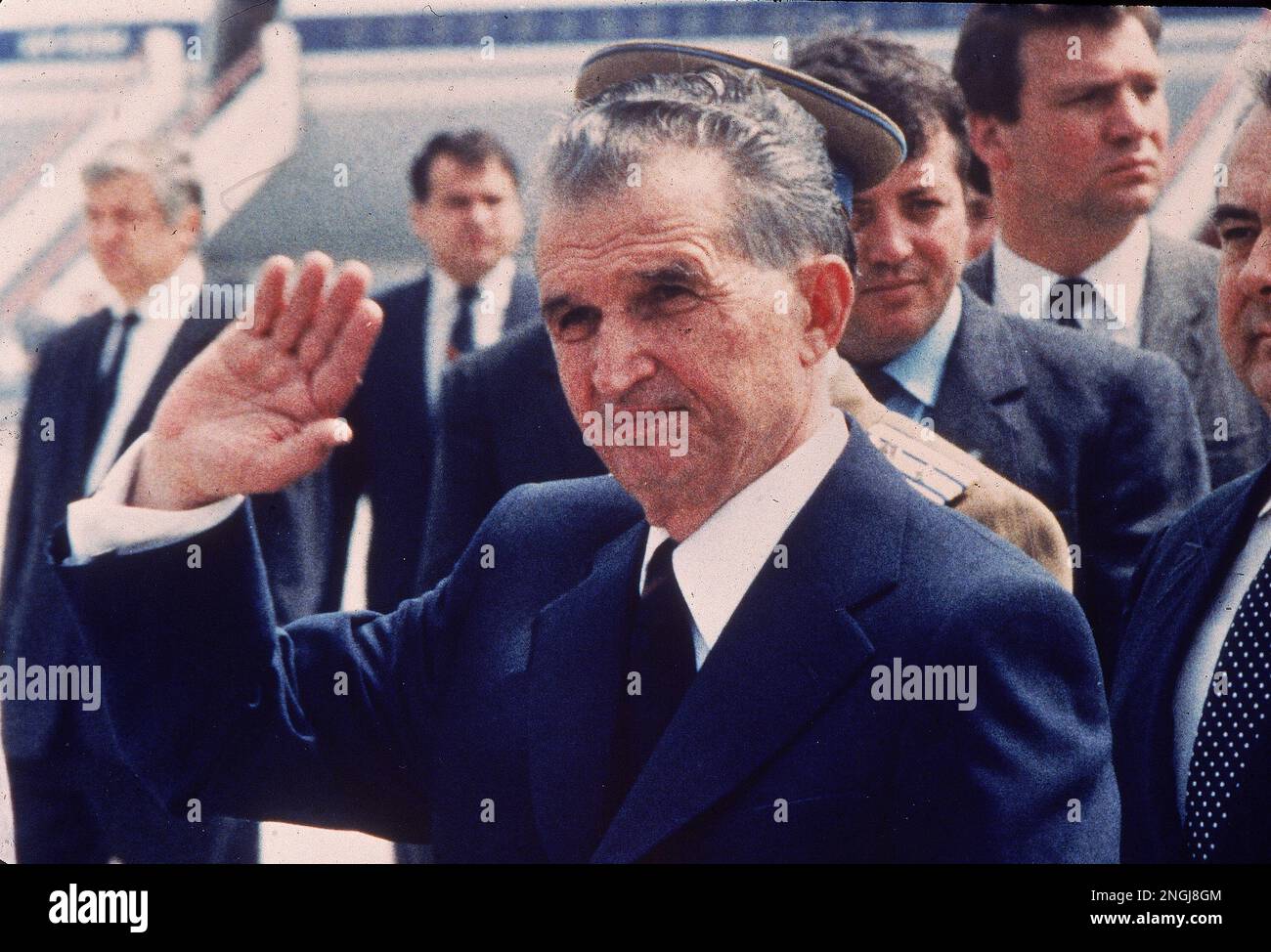 Romania's leader Nicolae Ceausescu waves to the crowds as he receives ...