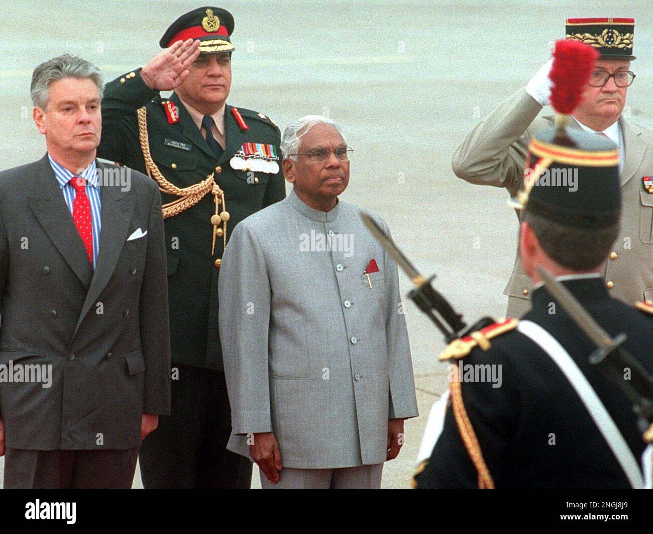 Indian President Kocheril Raman Narayanan, center, reviews the honour ...