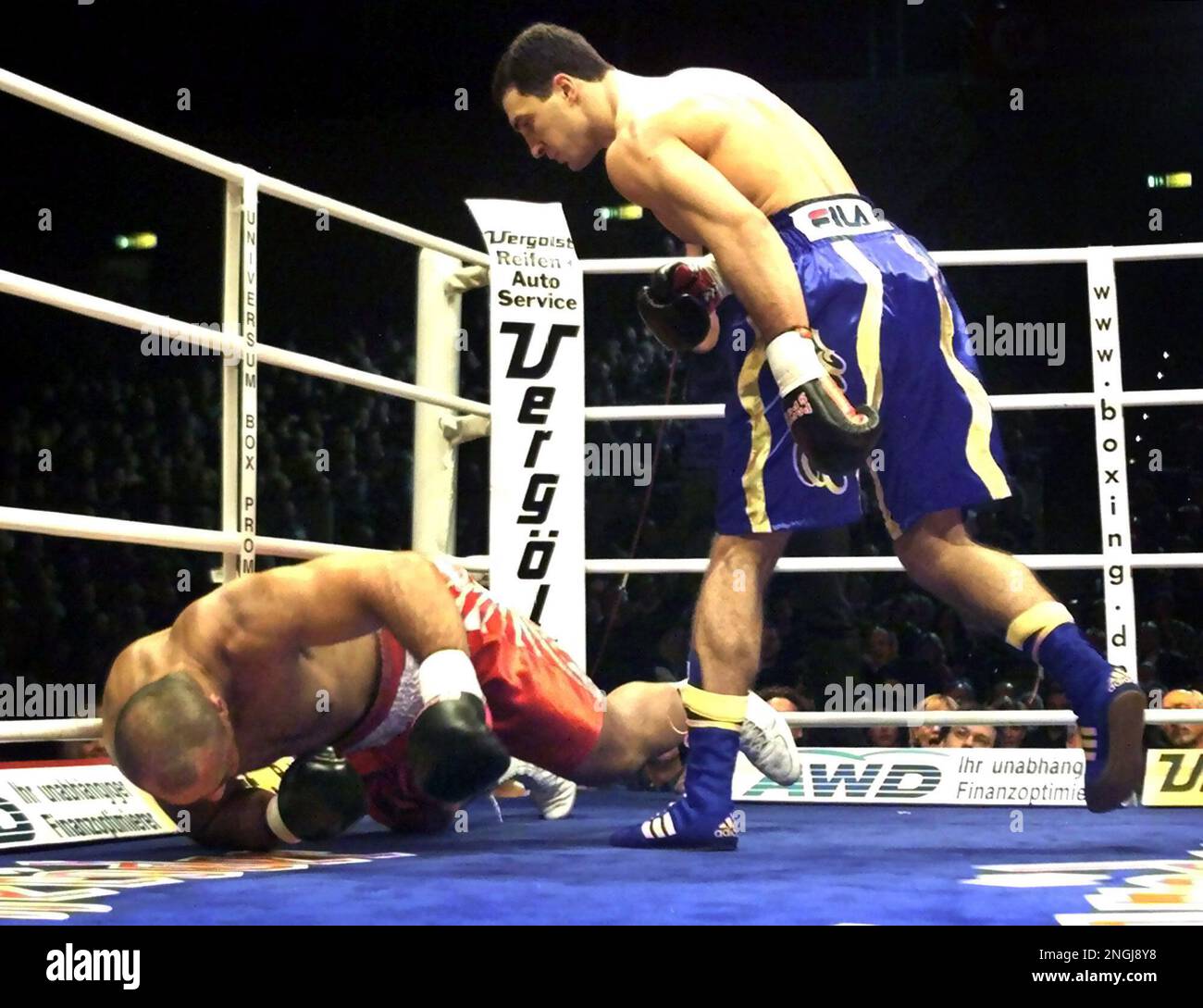 Ukrainian heavy weight boxer Wladimir Klitschko, right, looks down on ...