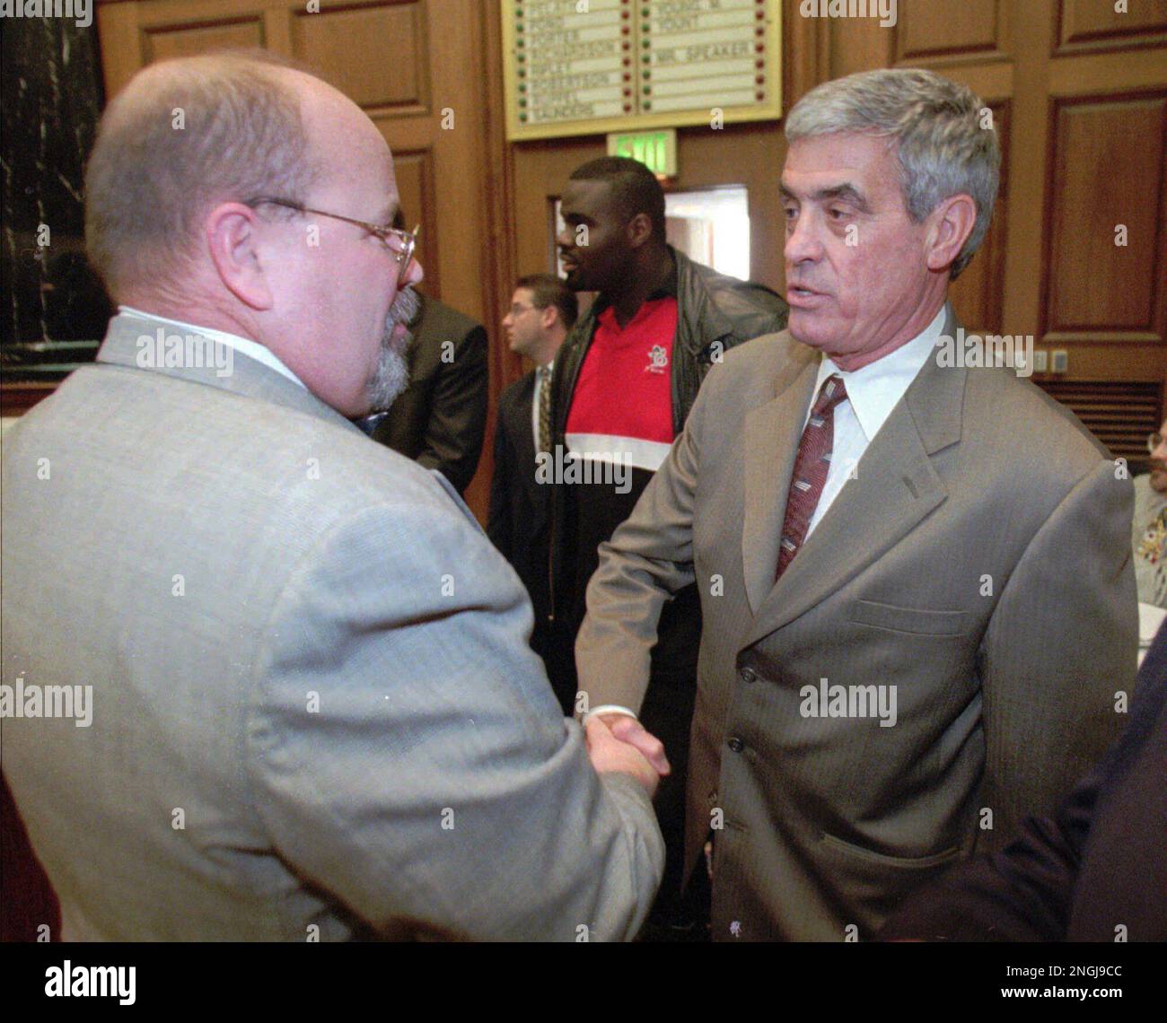 Indianapolis Colts coach Jim Mora, right, greets Indiana House Speaker ...