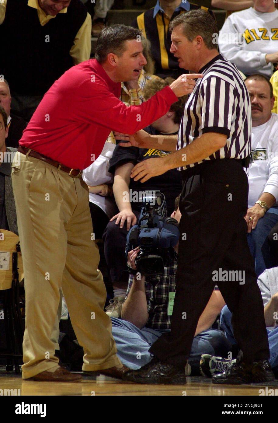 Iowa State basketball coach Larry Eustachy, left, argues with referee ...
