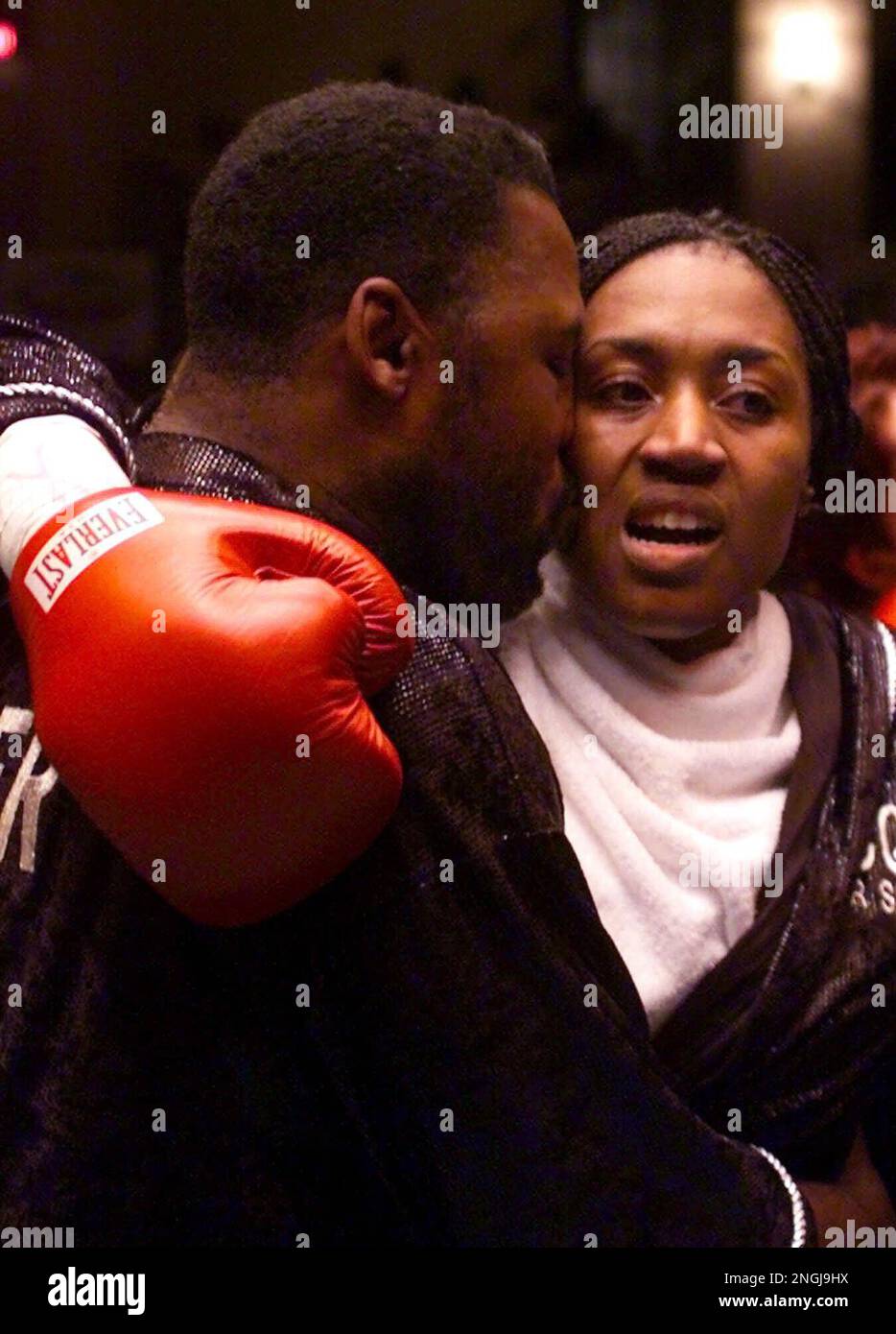 Jacqueline Frazier-Lyde, right, gets a hug and a kiss from her brother ...