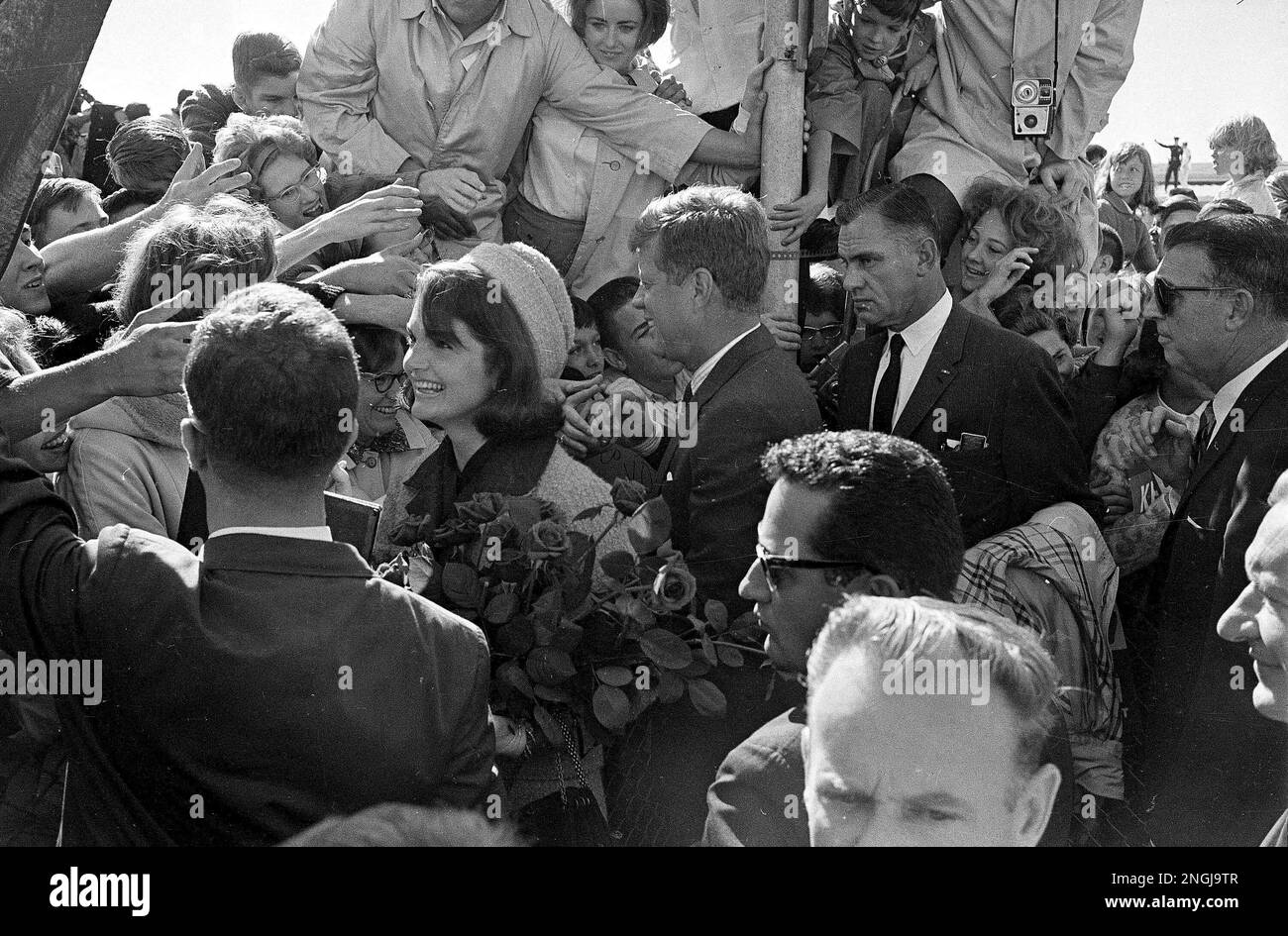 President Kennedy and first lady Jacqueline Kennedy receive an ...