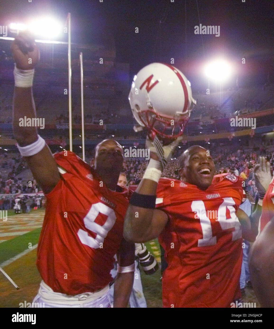 Nebraska's Wilson Thomas, left, and Jeff Perino celebrate as they leave ...