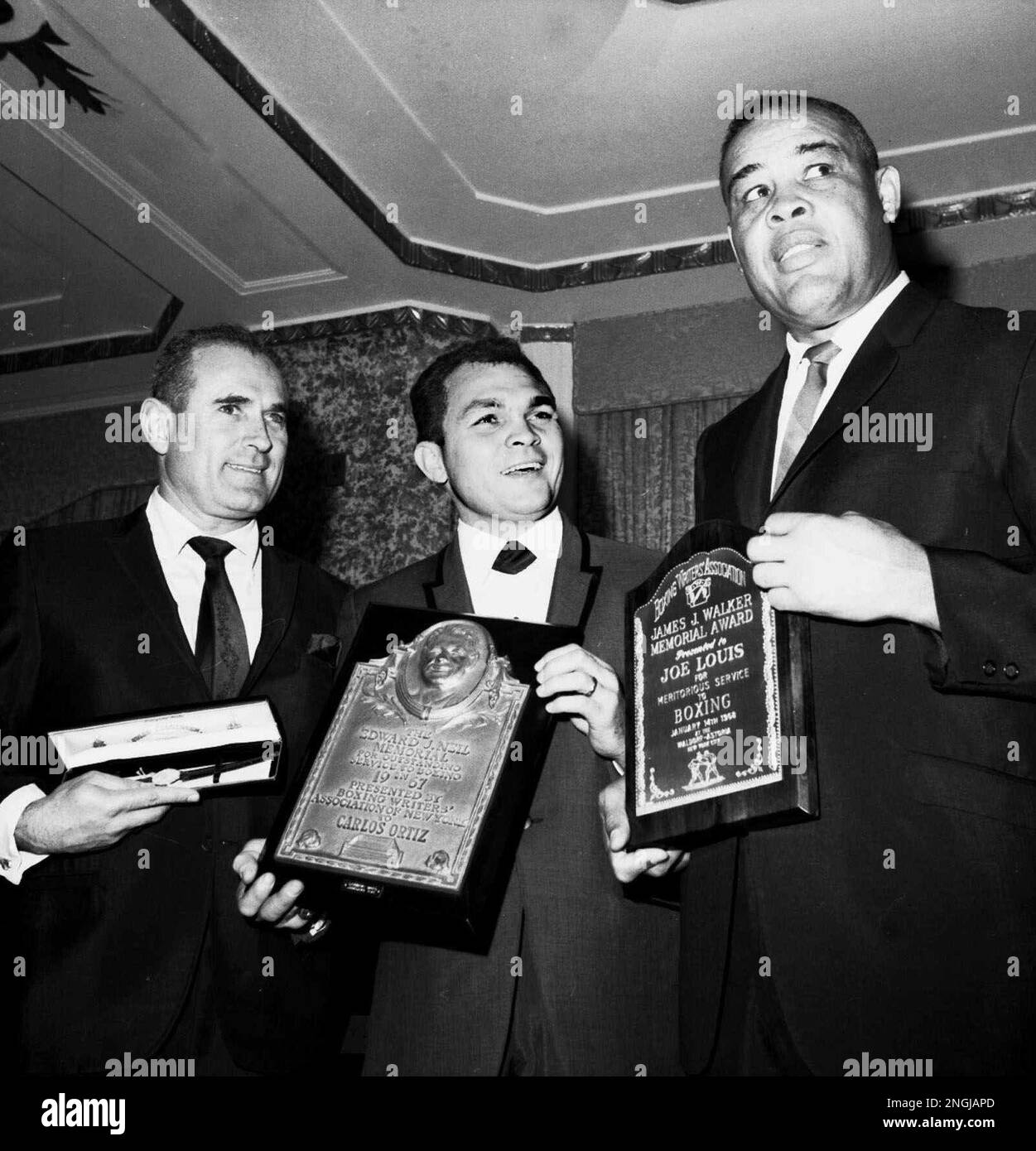The Boxing Writers Association presented awards Jan. 14, 1968 in New York to Gil Clancy, left ...