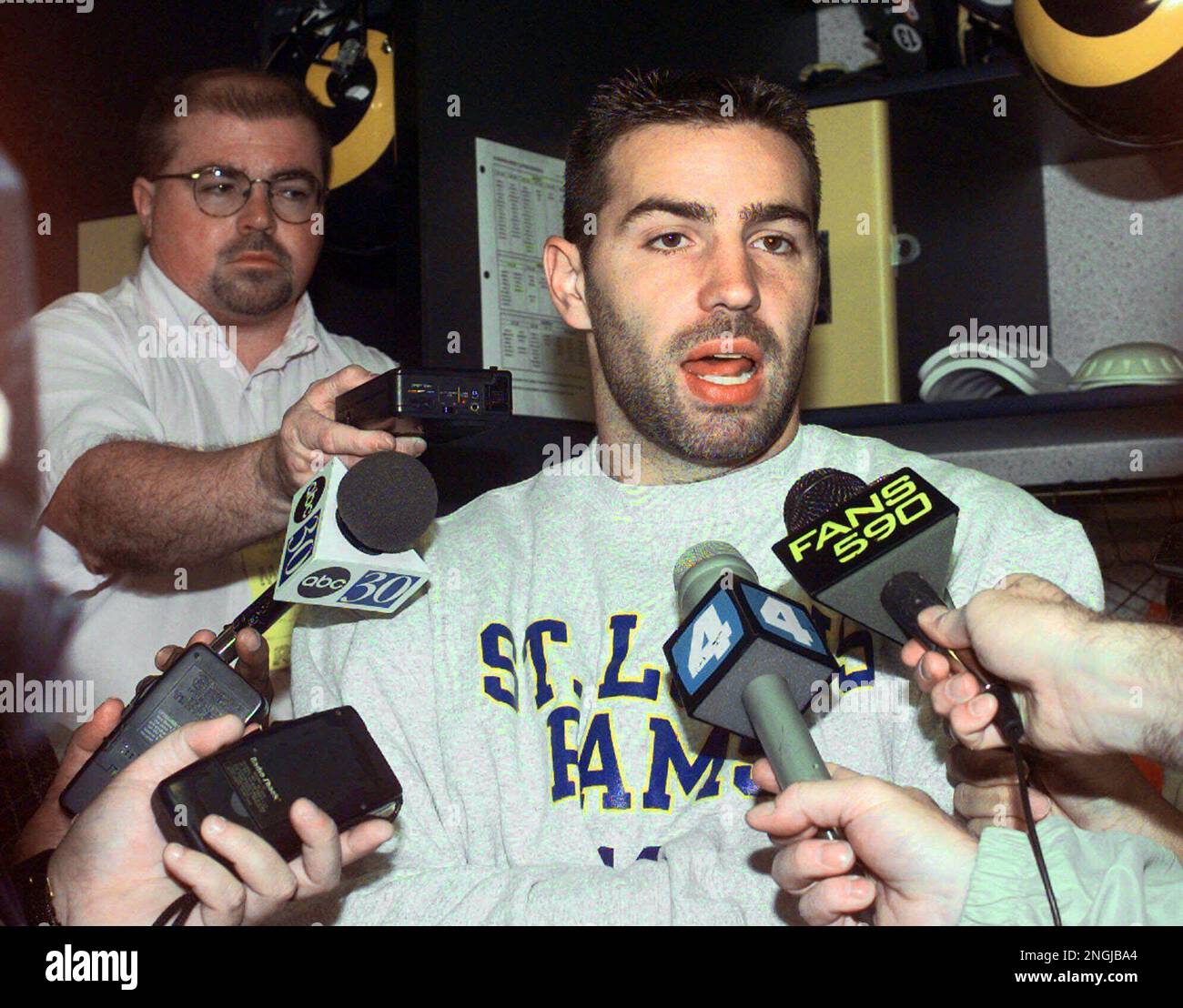 St. Louis Rams starting quarterback Kurt Warner responds to questions ...