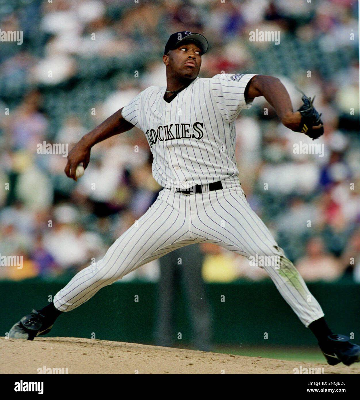 Colorado Rockies rookie pitcher Luther Hackman delivers a pitch to ...