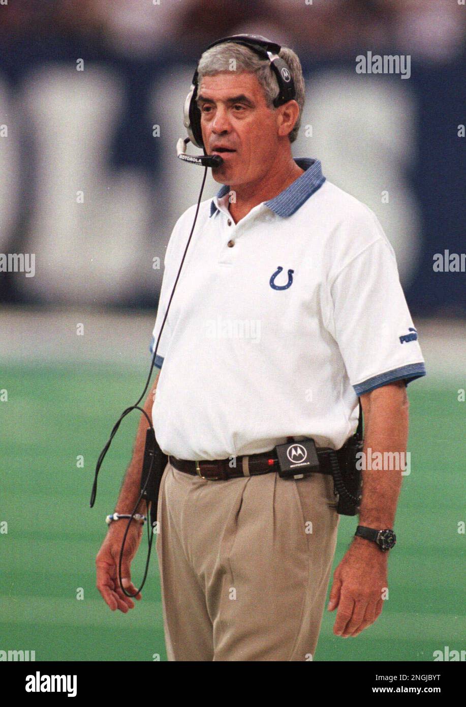 Indianapolis Colts coach Jim Mora calls in a play against the ...