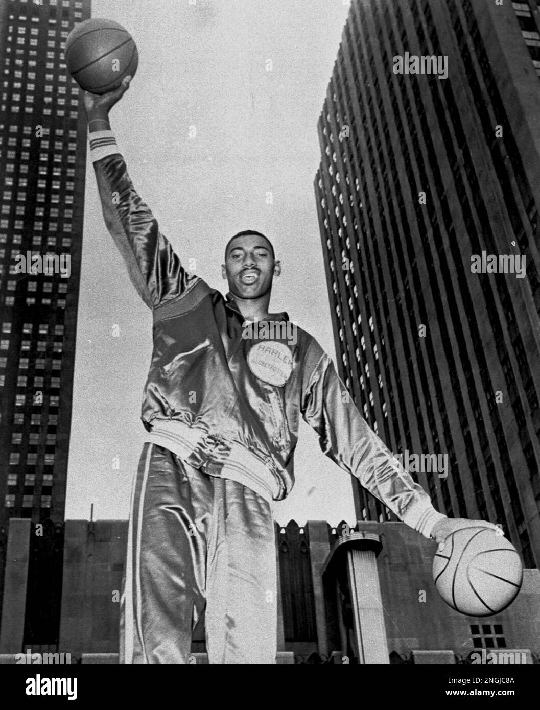 Wilt Chamberlain is shown as a member of the Harlem Globetrotters in ...