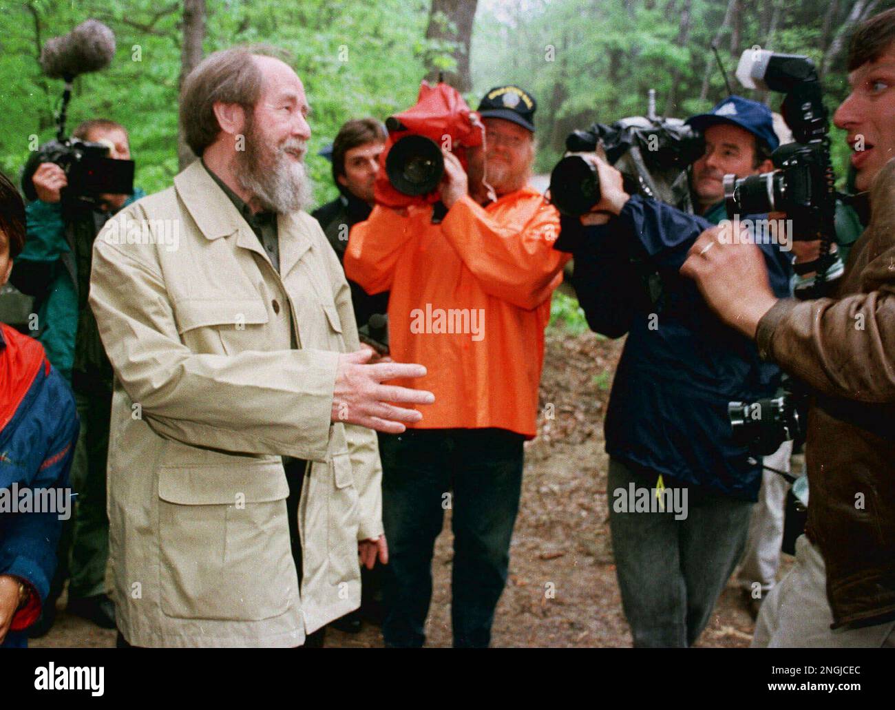 Alexander Solzhenitsyn jokes with the media as he leaves his long-time ...