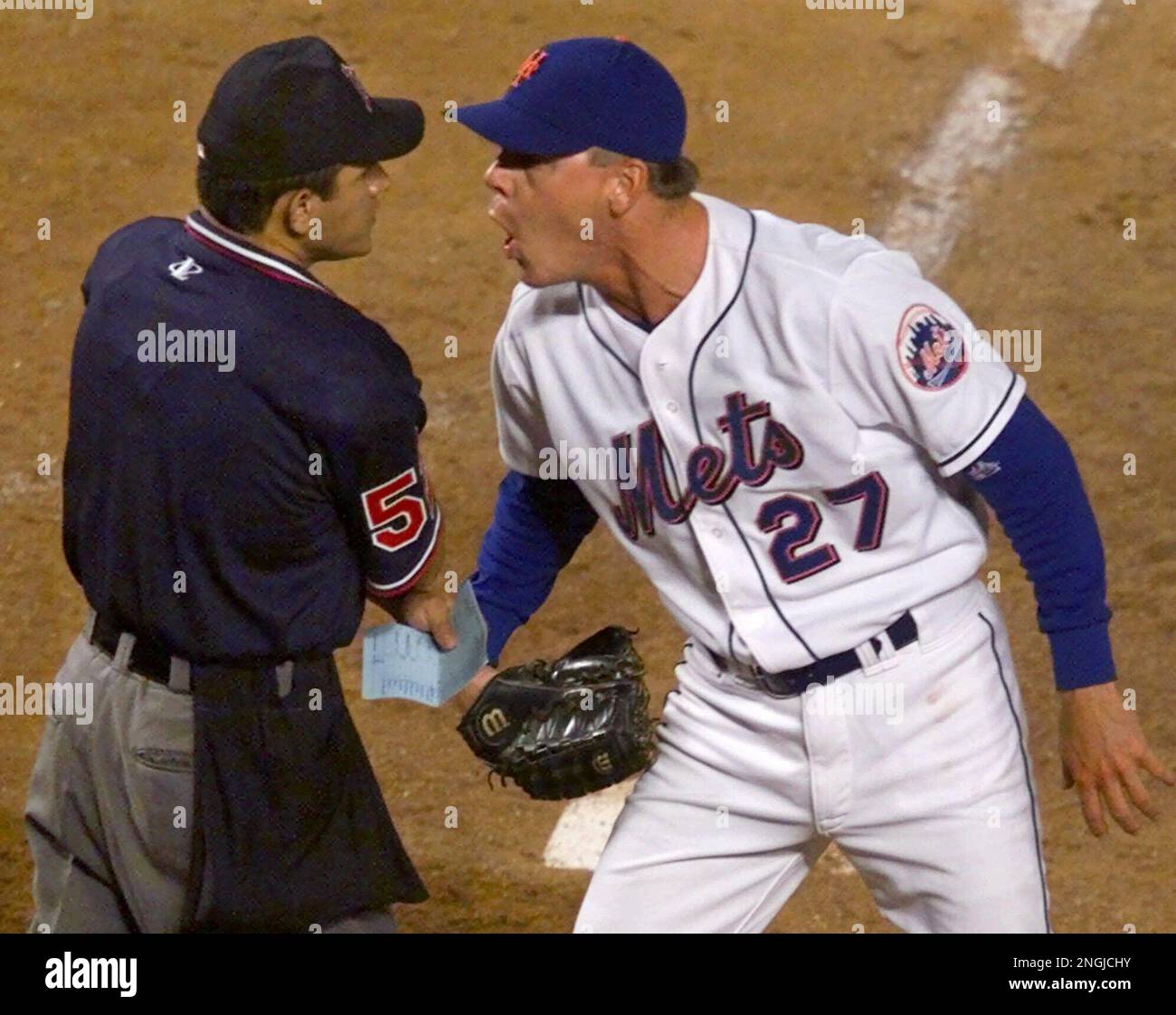 New York Mets pitcher Dennis Cook goes nose to nose with plate umpire ...