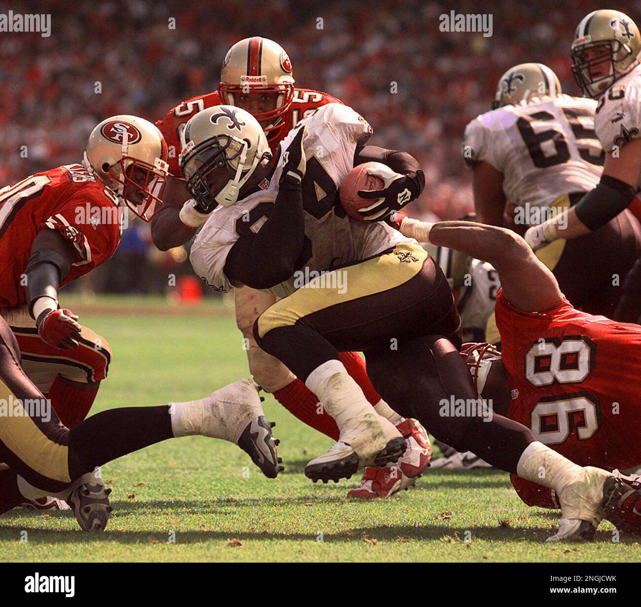 New Orleans Saints' Ricky Williams (34) breaks a tackle from San ...