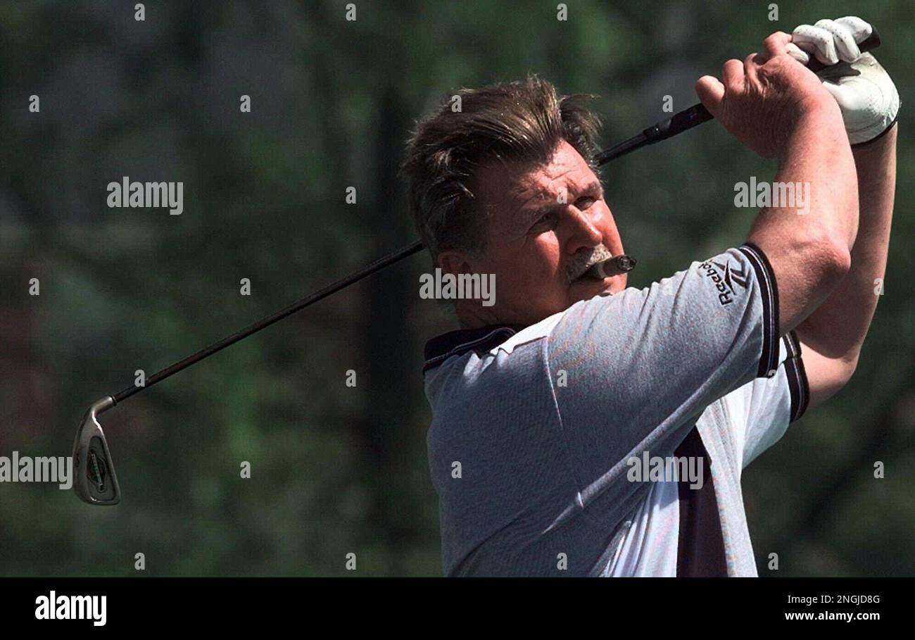New Orelans Saints coach Mike Ditka watches the flight of his ball of ...