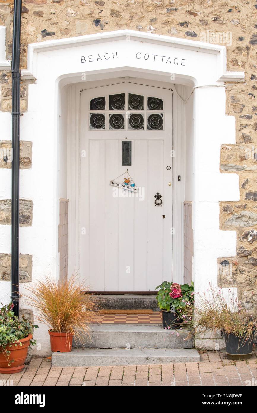 A picturesque doorway in the fishing village of Beer in Devon, England ...