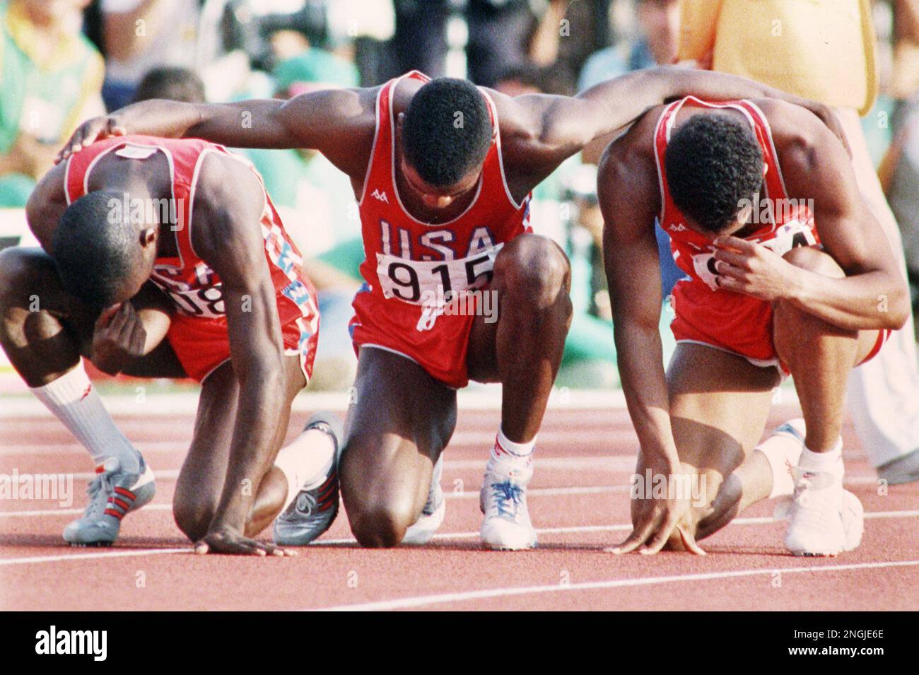 U.S. sprinter Carl Lewis, center, leads Thomas Jefferson, left, and ...