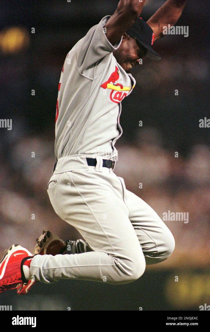 St. Louis Cardinals pitcher Jose Jimenez jumps into the air after the ...
