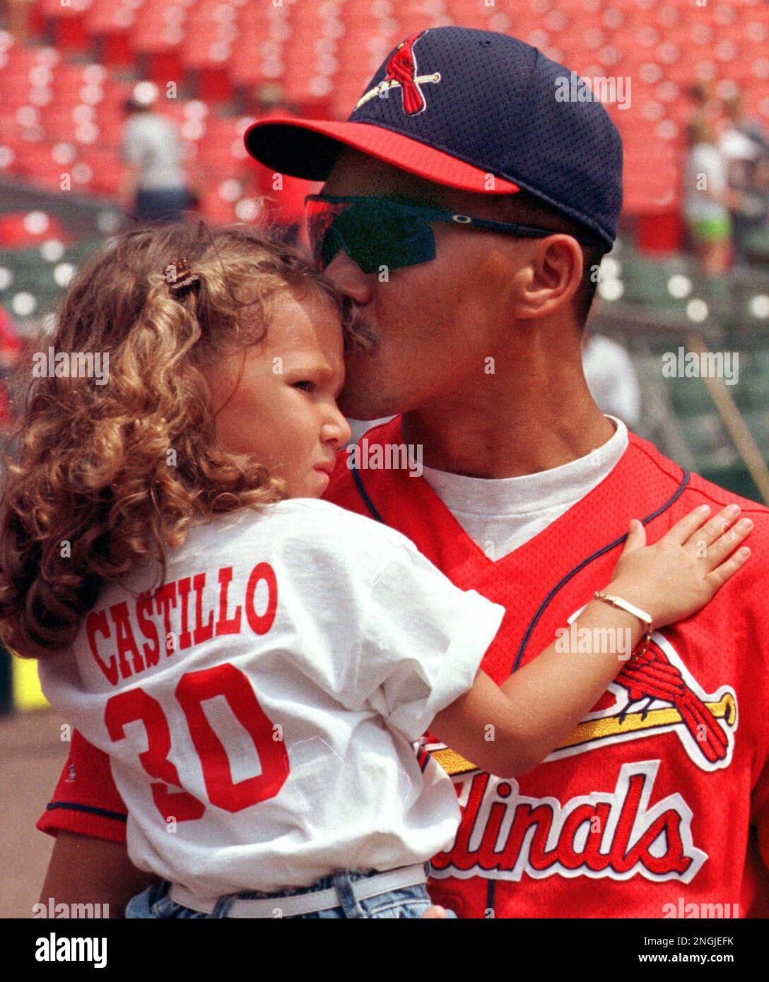 St. Louis Cardinals Alberto Castillo shares a quiet moment with his ...