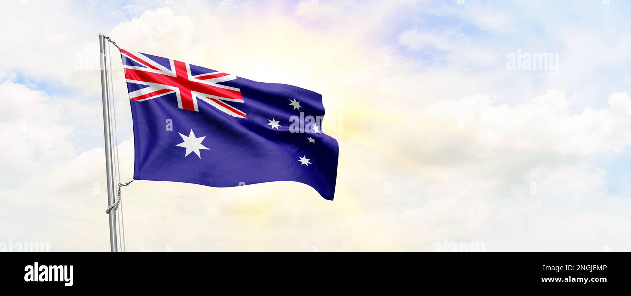 Australia flag waving on sky background. 3D Rendering Stock Photo - Alamy