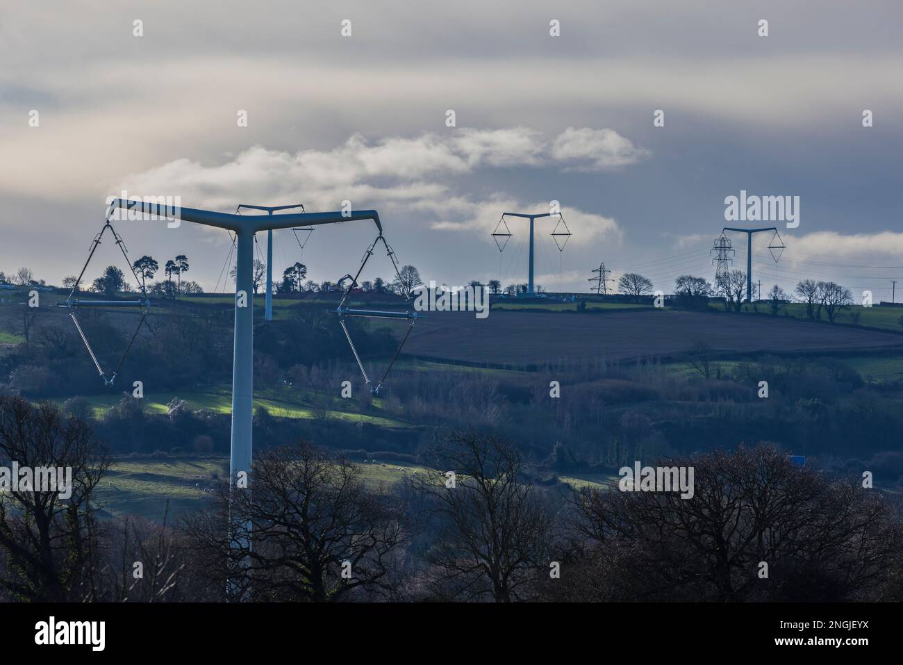 The new t pylon design under construction Stock Photo - Alamy