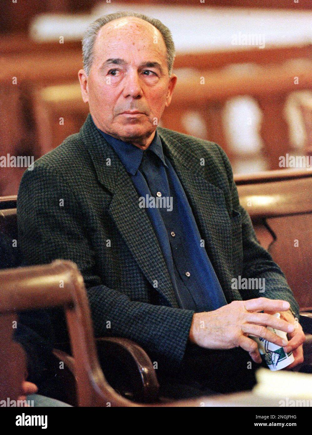 Louis "Baby Shacks" Manocchio listens during his trial Monday, April 12 ...