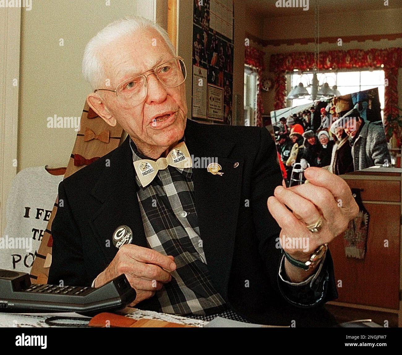 Mel Knoke, 90, of Appleton, Wis., proudly displays a picture of him at ...