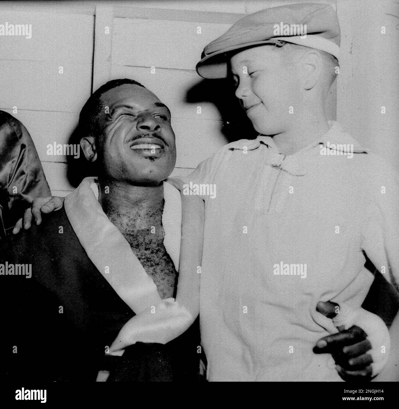 Light heavyweight champion Archie Moore gives his ok on his fight with ...