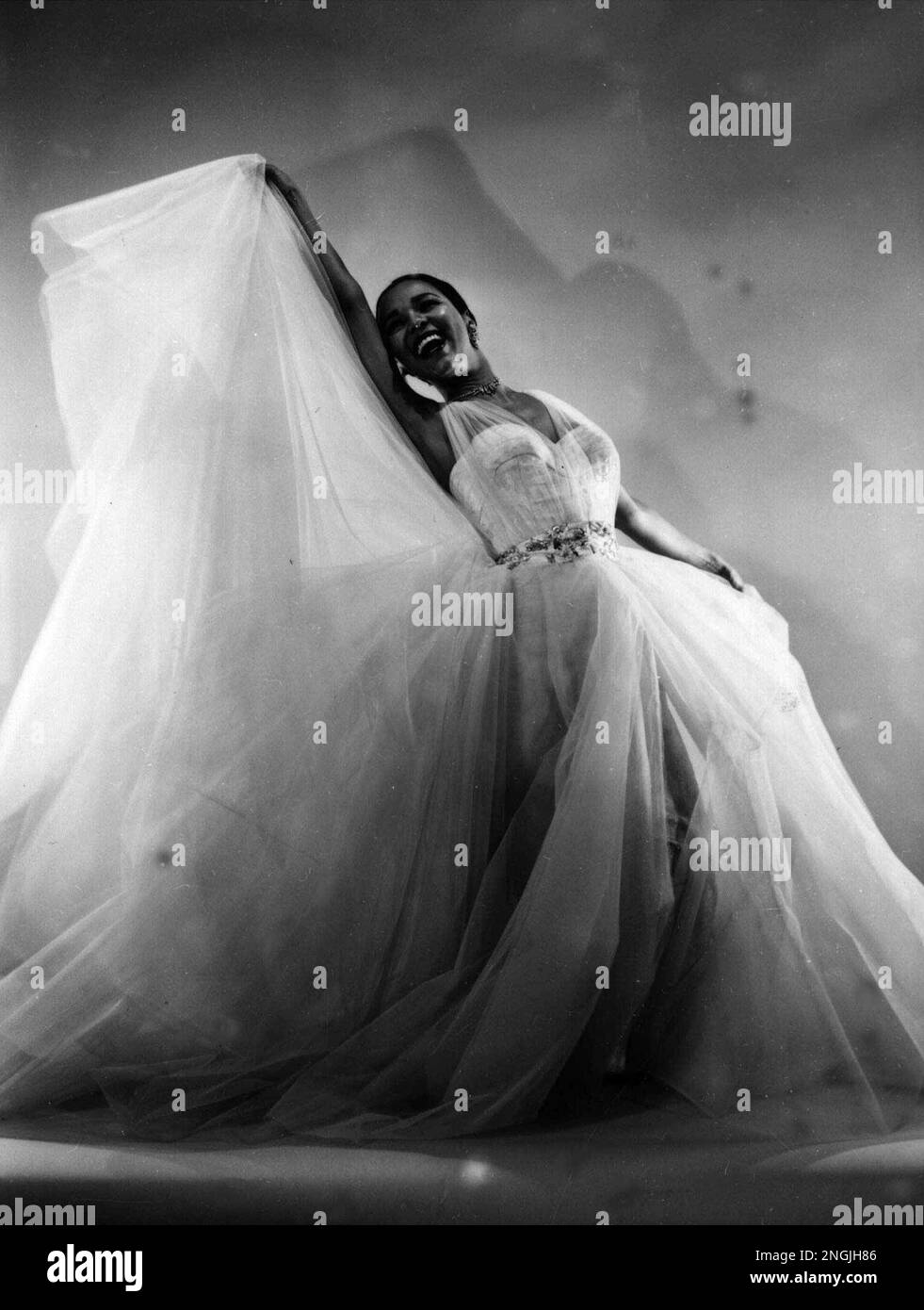 Off comes the silver mink cape as singer Dorothy Dandriged sings of ...