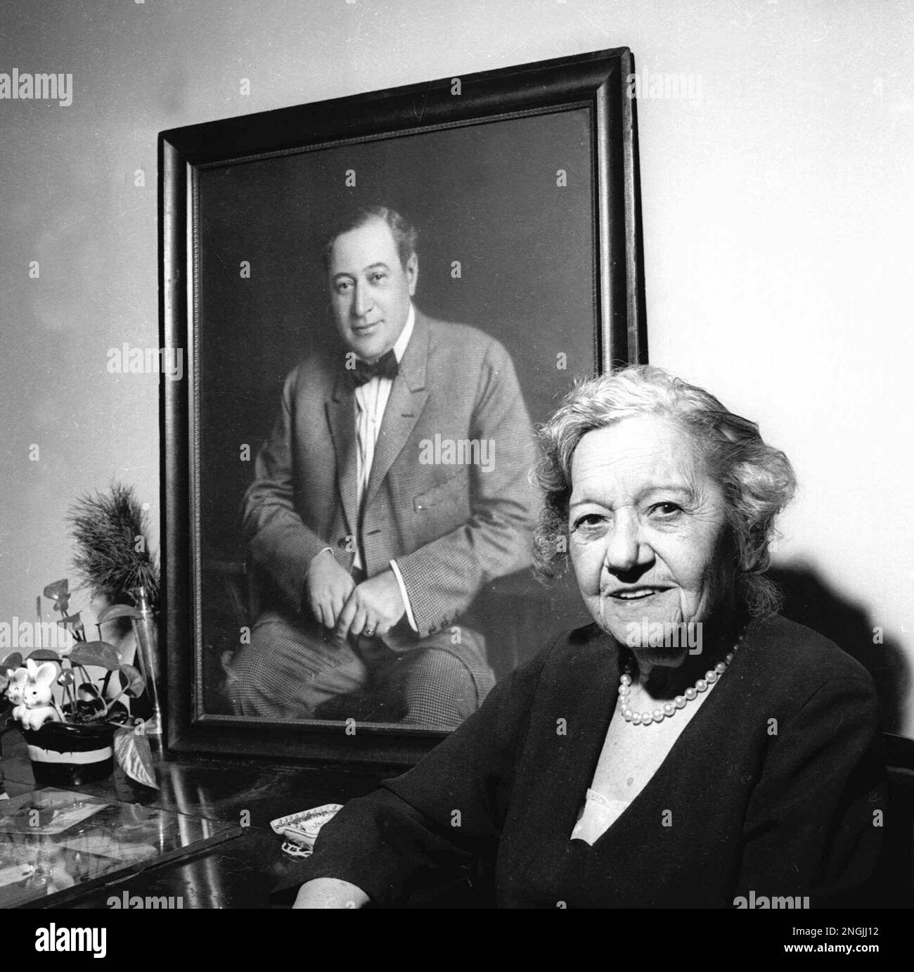 Mrs. Renee Harris, New York's first woman theatrical producer, sits ...