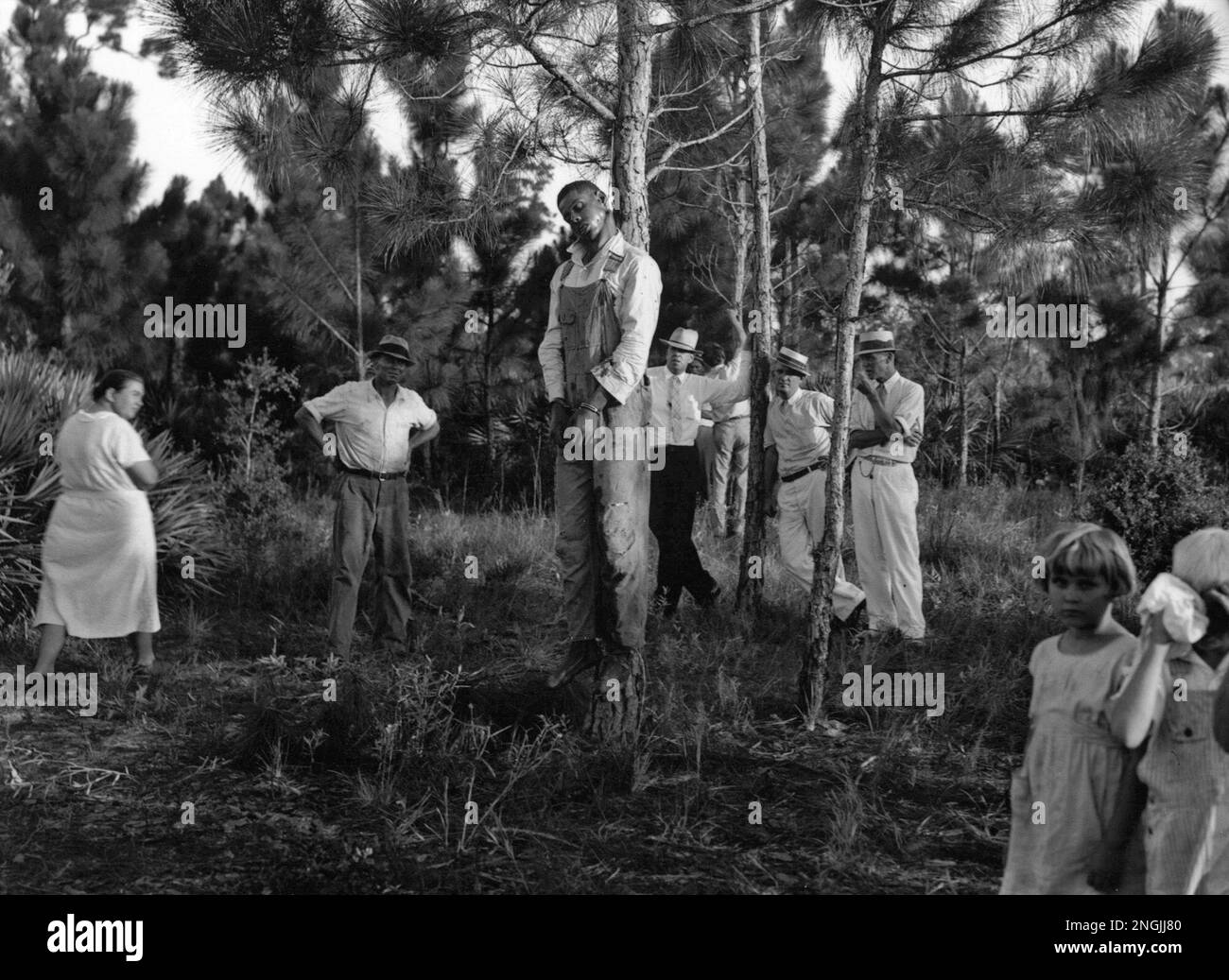 The body of 32-year-old Rubin Stacy hangs from a tree in Fort ...