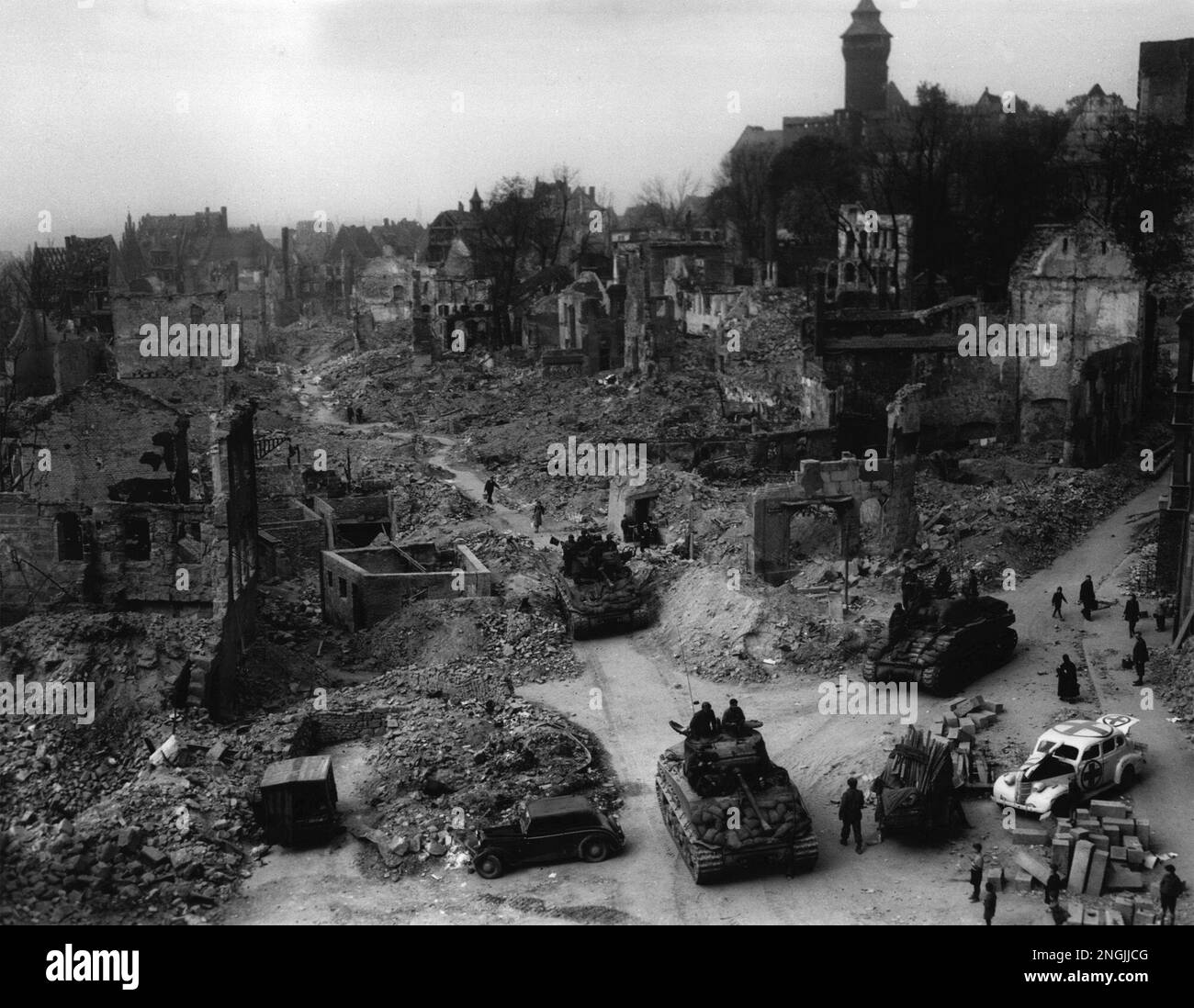 Tanks of the U.S. 7th Army rumble through Nuremberg April 23, 1945. The ...