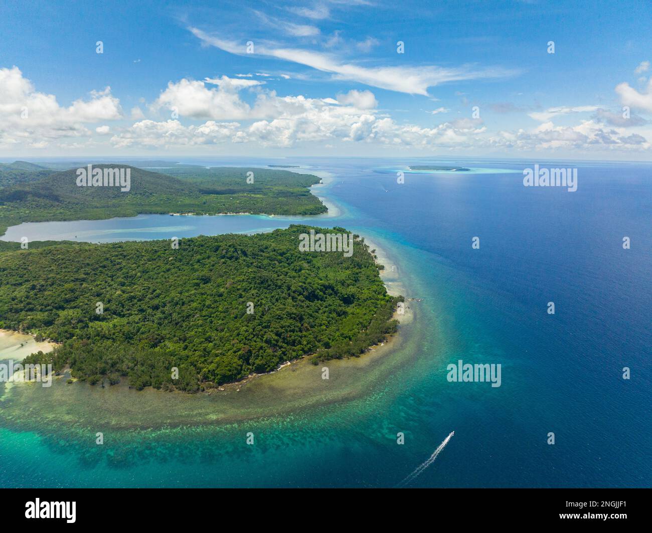 Aerial view of Balabac island with tropical forest and blue sea ...