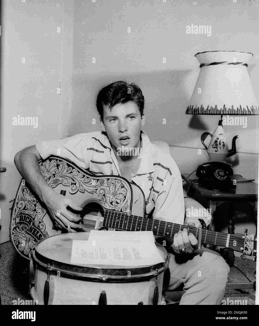 Singer Ricky Nelson, who is mobbed by teen-agers whenever he makes a ...