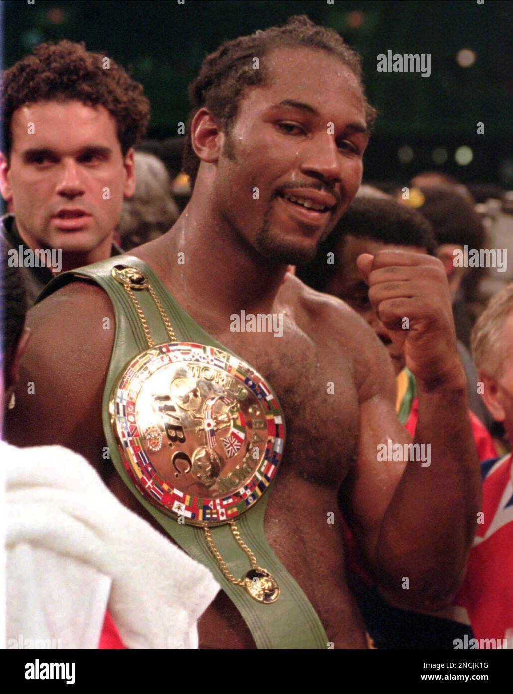 WBC heavyweight champion Lennox Lewis, right, from London, England ...