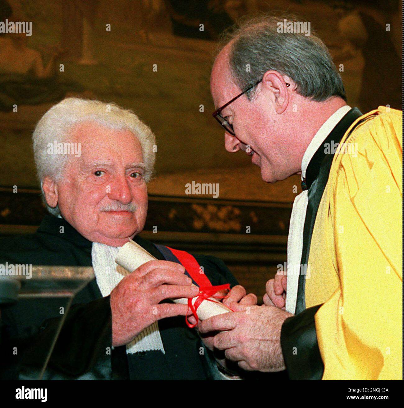 Brazilian writer Jorge Amado, left, receives an Honoris Causa diploma ...