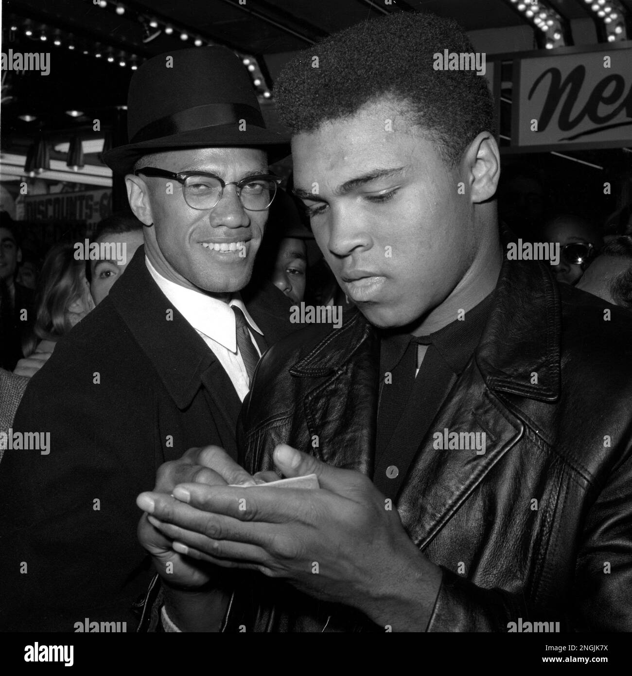 World Heavyweight Boxing Champion, Muhammad Ali, right, is shown with ...