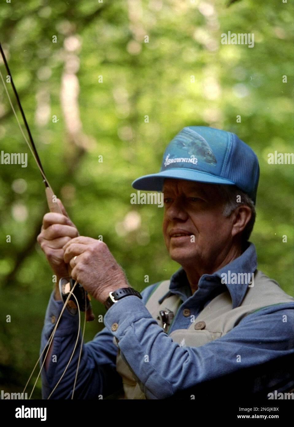 Former President Jimmy Carter watches the float of his black ant fly as ...