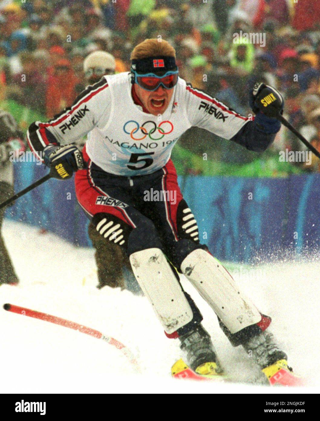 Norway's Ole Christian Furuseth passes a gate on his way to winning the ...