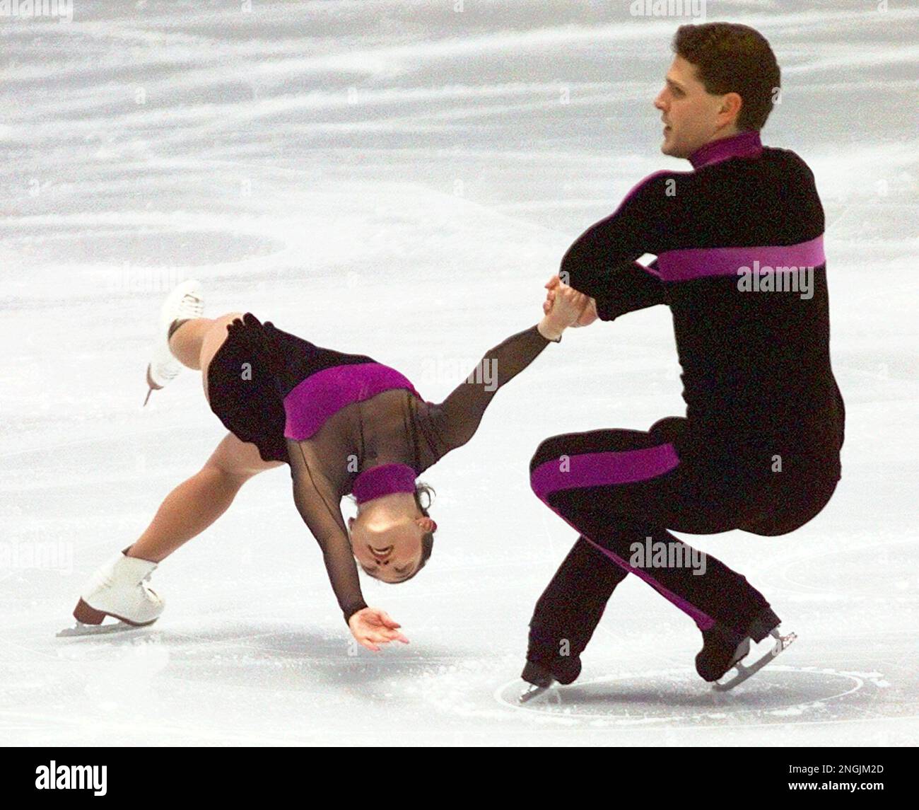 American pair Kyoko Ina and Jason Dungjen perform a death spiral during ...
