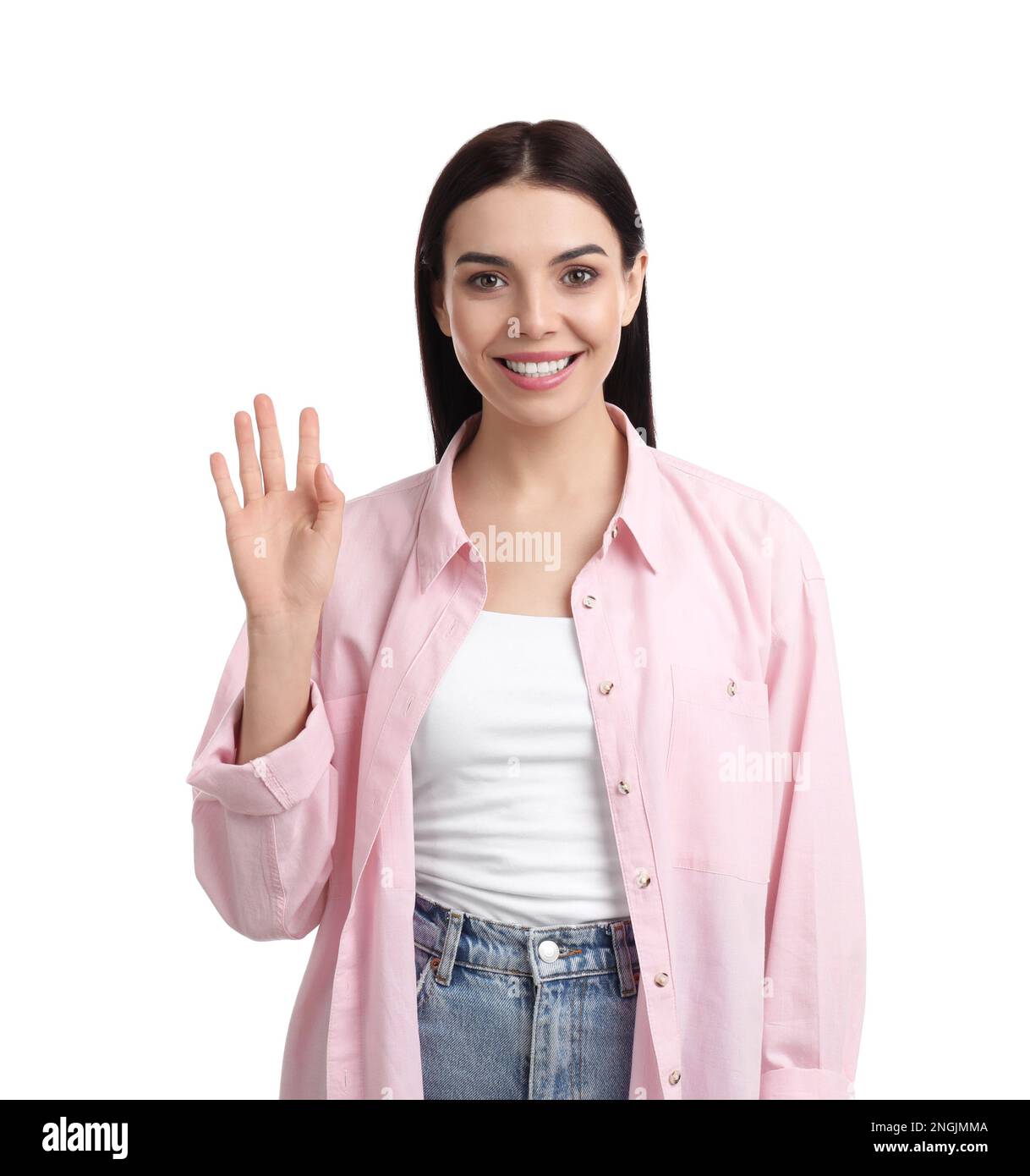 Attractive young woman showing hello gesture on white background Stock ...
