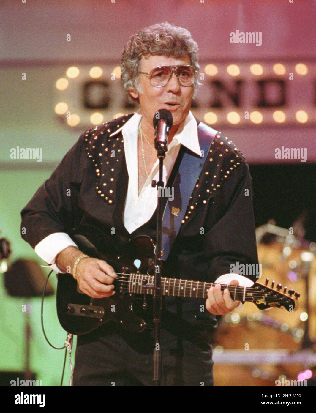 Carl Perkins, the rock 'n' roll pioneer whose song "Blue Suede Shoes ...